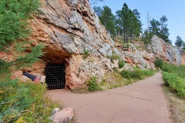 Hike the Canyons Trail to see Jewel Cave natural entrance without a ...